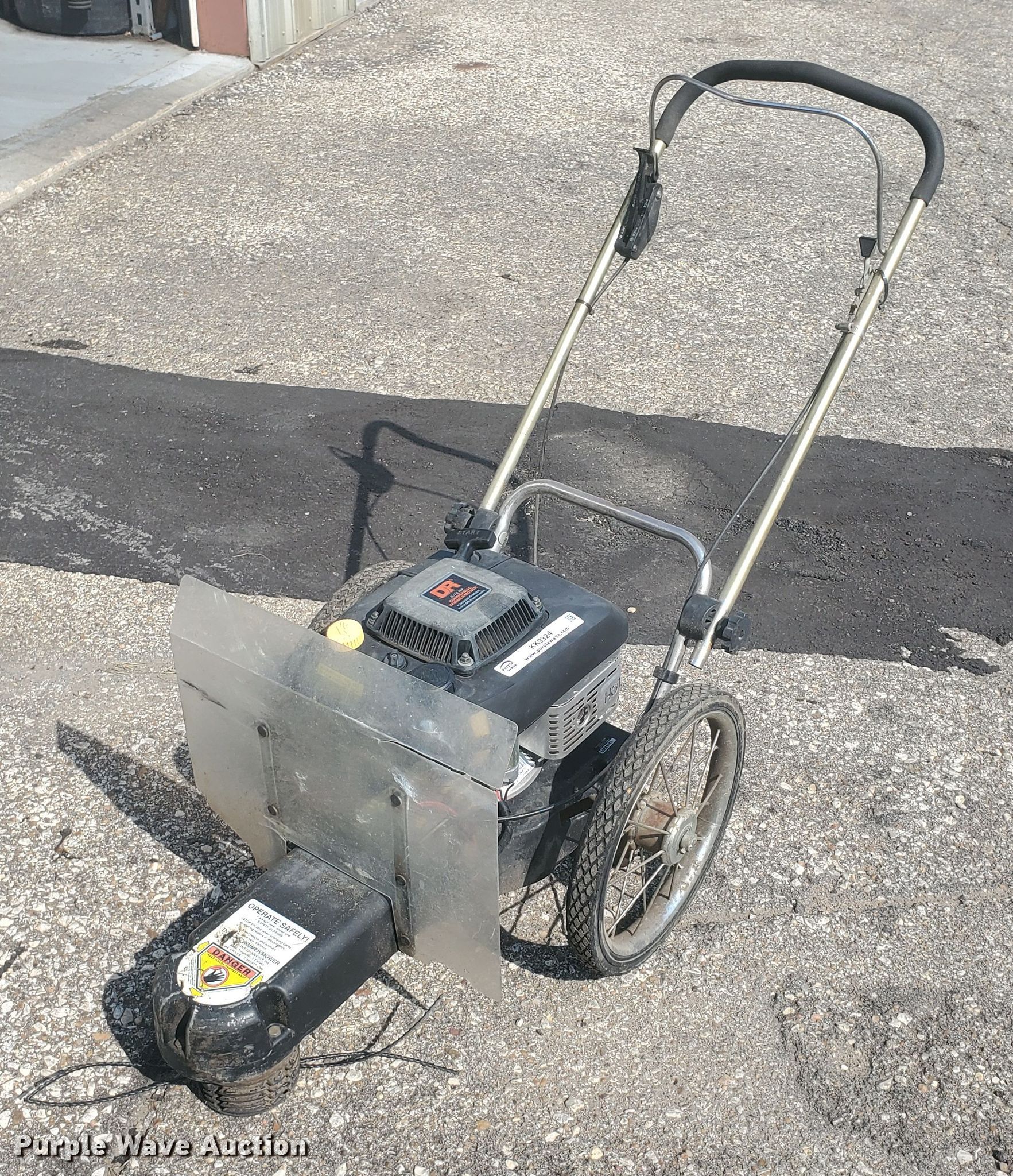 DR string trimmer in Salina, KS | Item KK9324 sold | Purple Wave