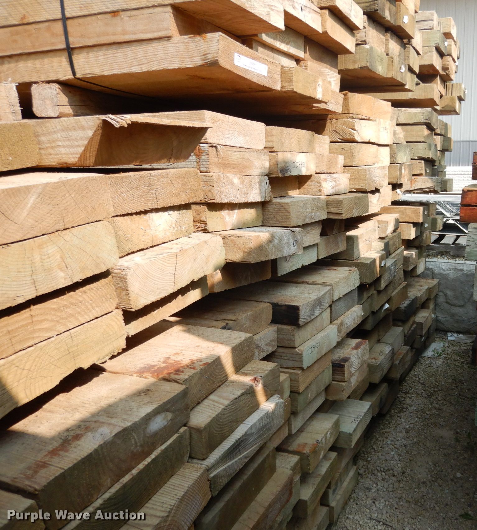 (12) bundles of lumber in Rochester, MN | Item JI9451 sold | Purple Wave