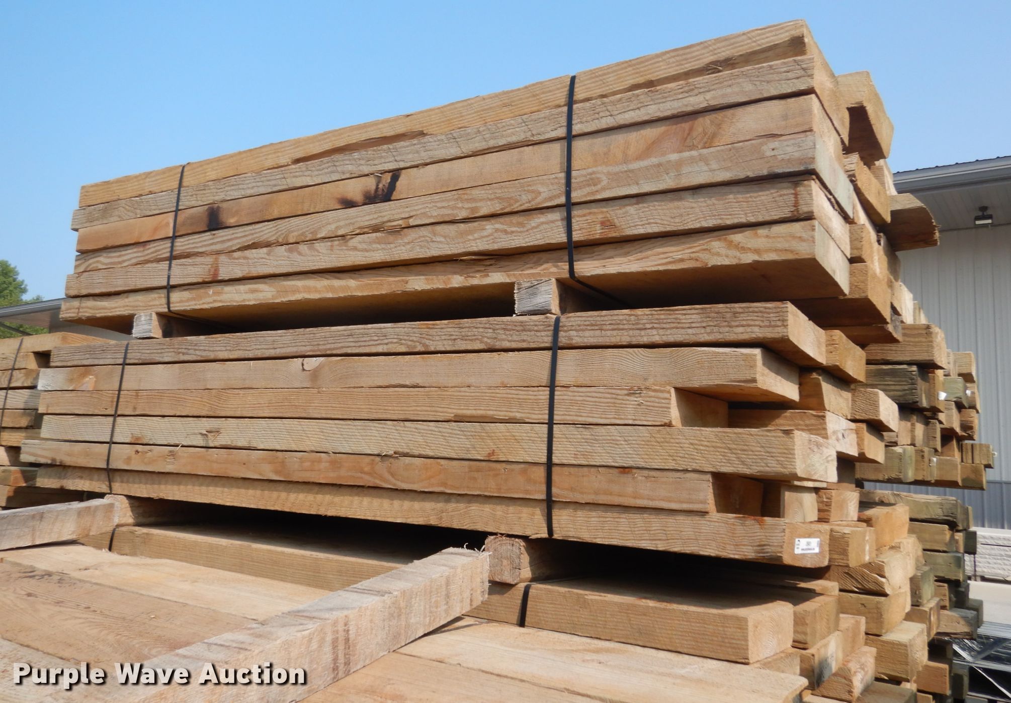 (12) bundles of lumber in Rochester, MN | Item JI9451 sold | Purple Wave