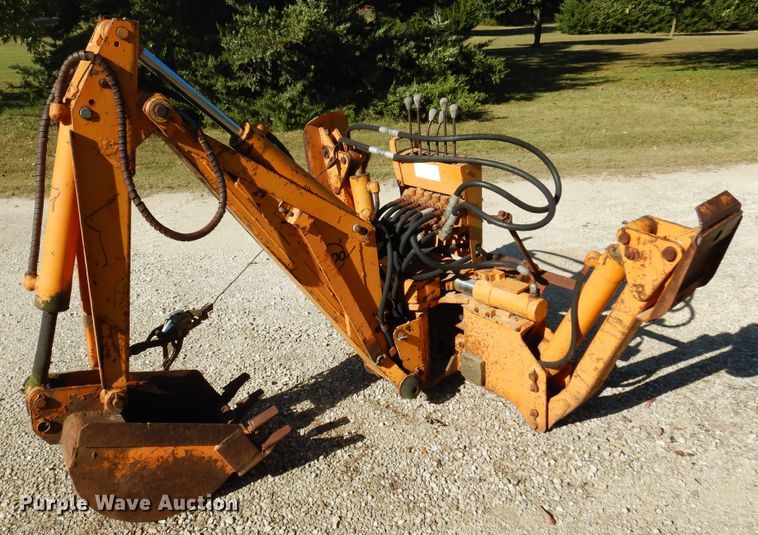 D100 skid steer backhoe in Towanda, KS | Item JT9558 sold | Purple Wave