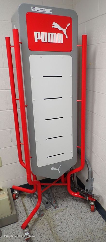 Puma retail display in Hutchinson, KS | Item IV9473 sold | Purple Wave