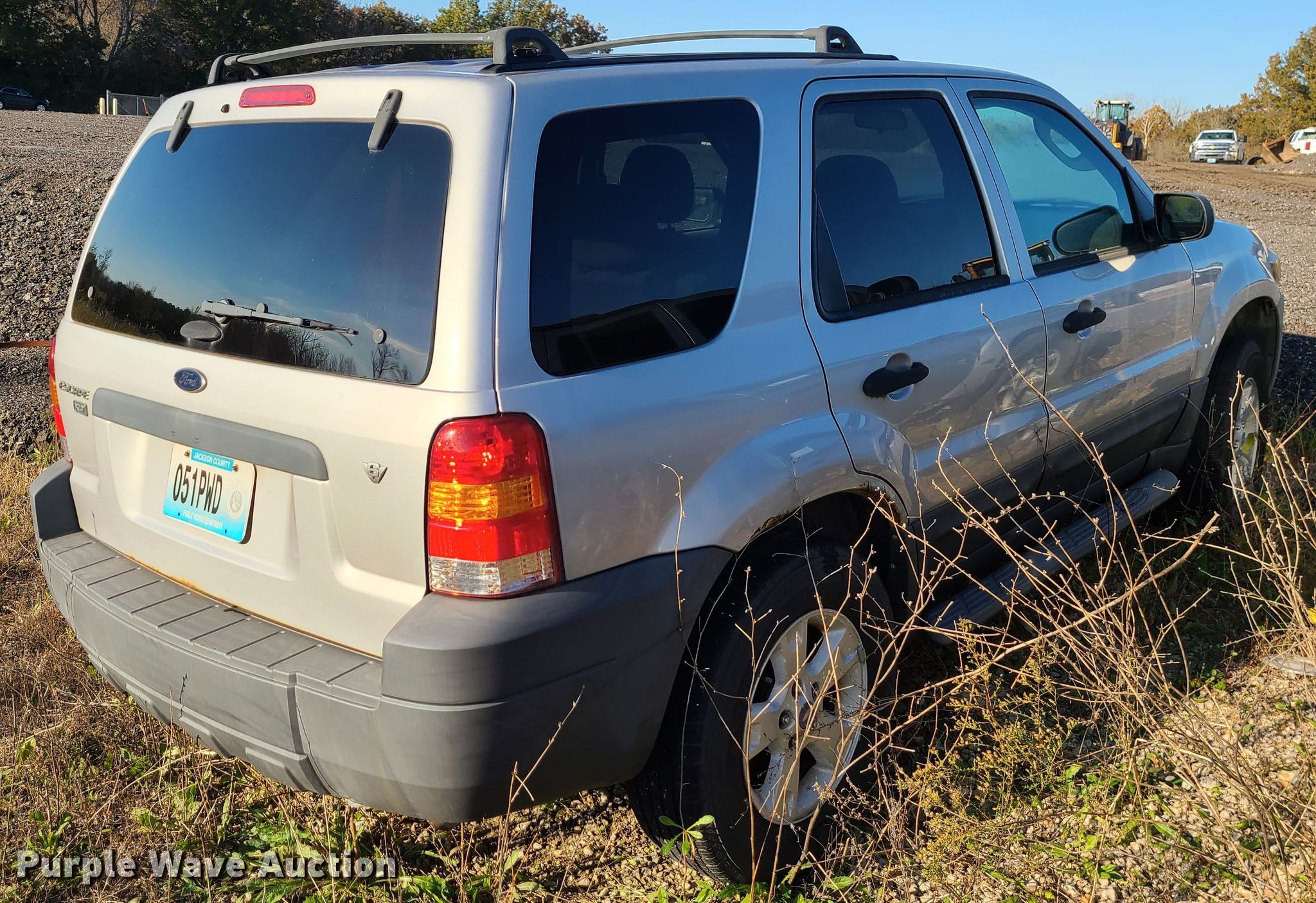 2005 Ford Escape SUV in Oak Grove, MO | Item DK1310 sold | Purple Wave