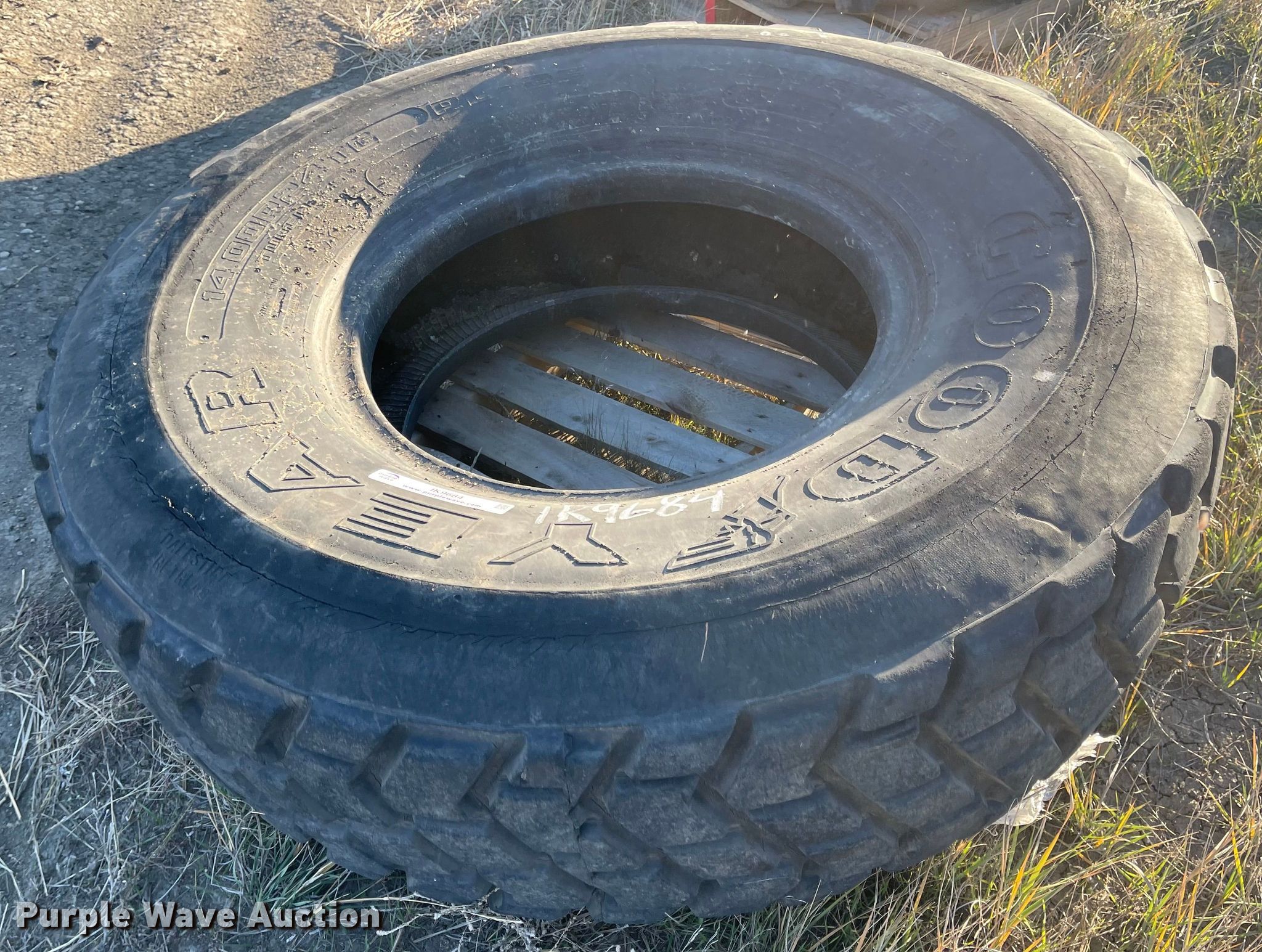 14.00R24 tire in Pierre, SD | Item IK9684 sold | Purple Wave