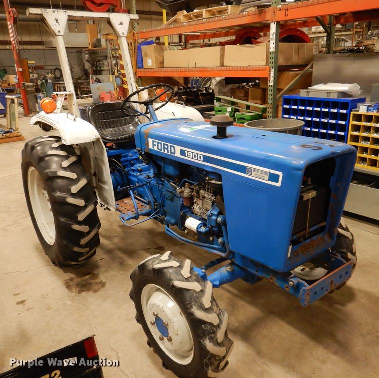Ford 1900 MFWD tractor in Des Moines, IA | Item KG9945 sold | Purple Wave
