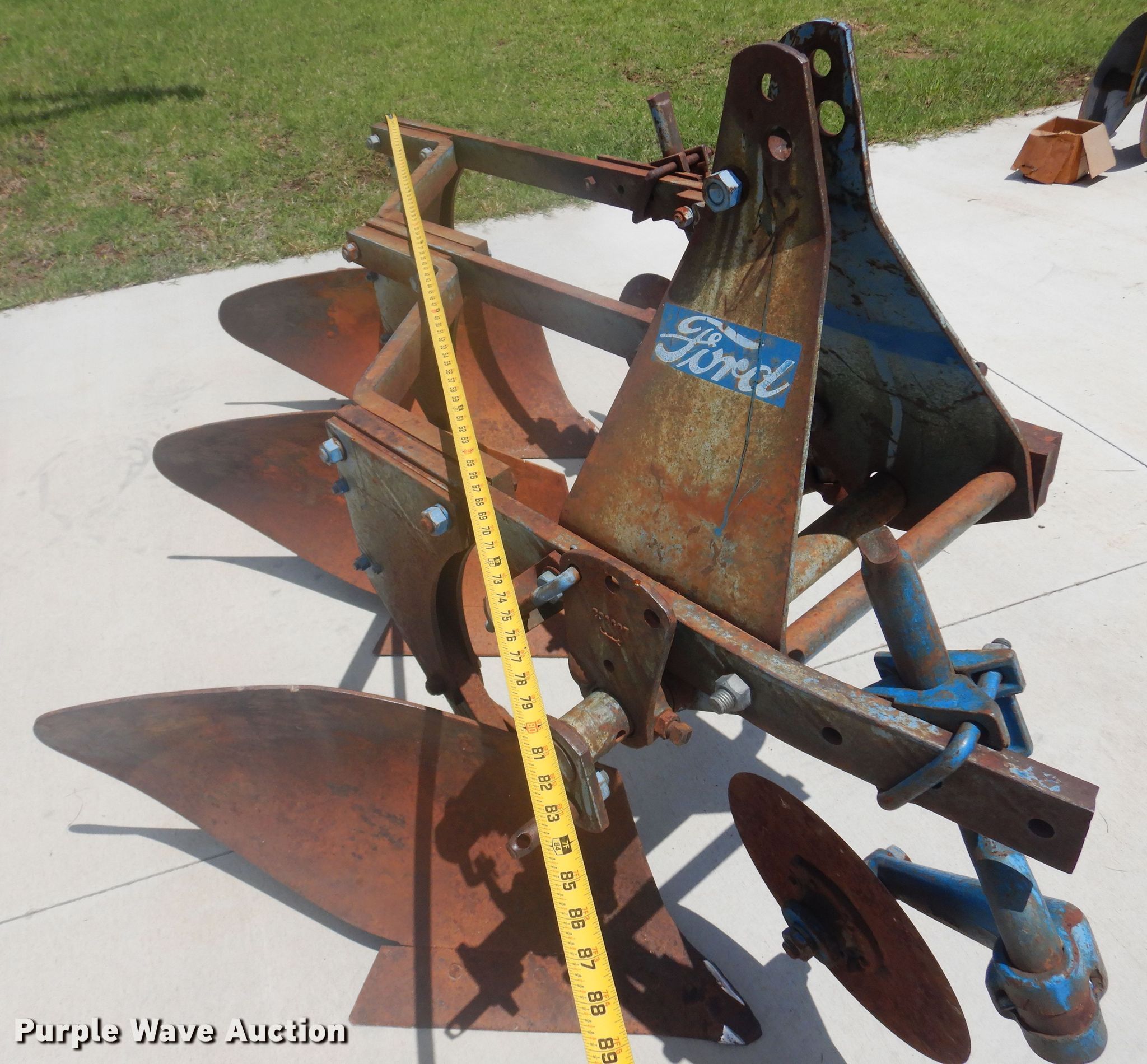 Ford three bottom plow in Ponca City, OK | Item DN0367 sold | Purple Wave