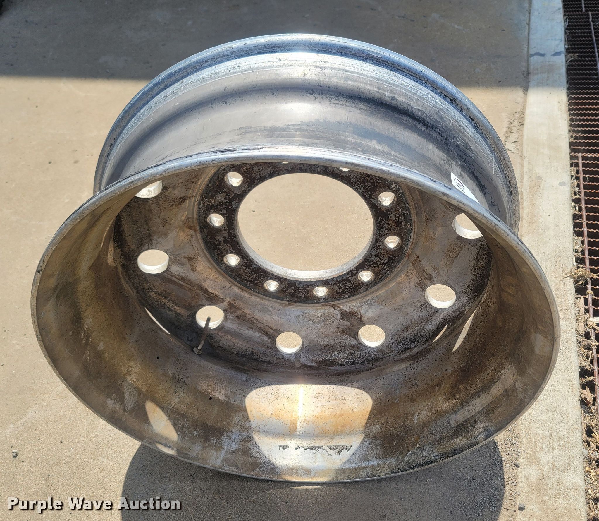 (2) 24.5x10 wheels in Rudy, AR | Item LM9778 sold | Purple Wave