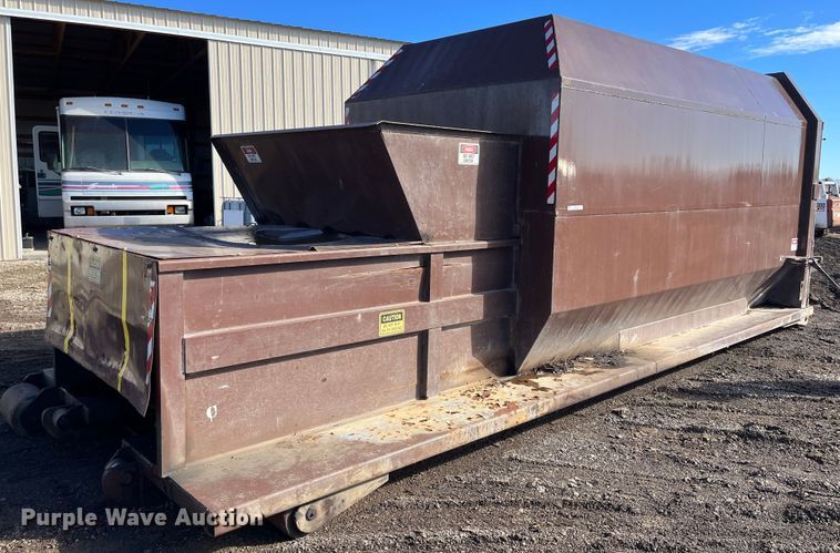 Roll off trash compactor in Perry , KS | Item LP9794 sold | Purple Wave