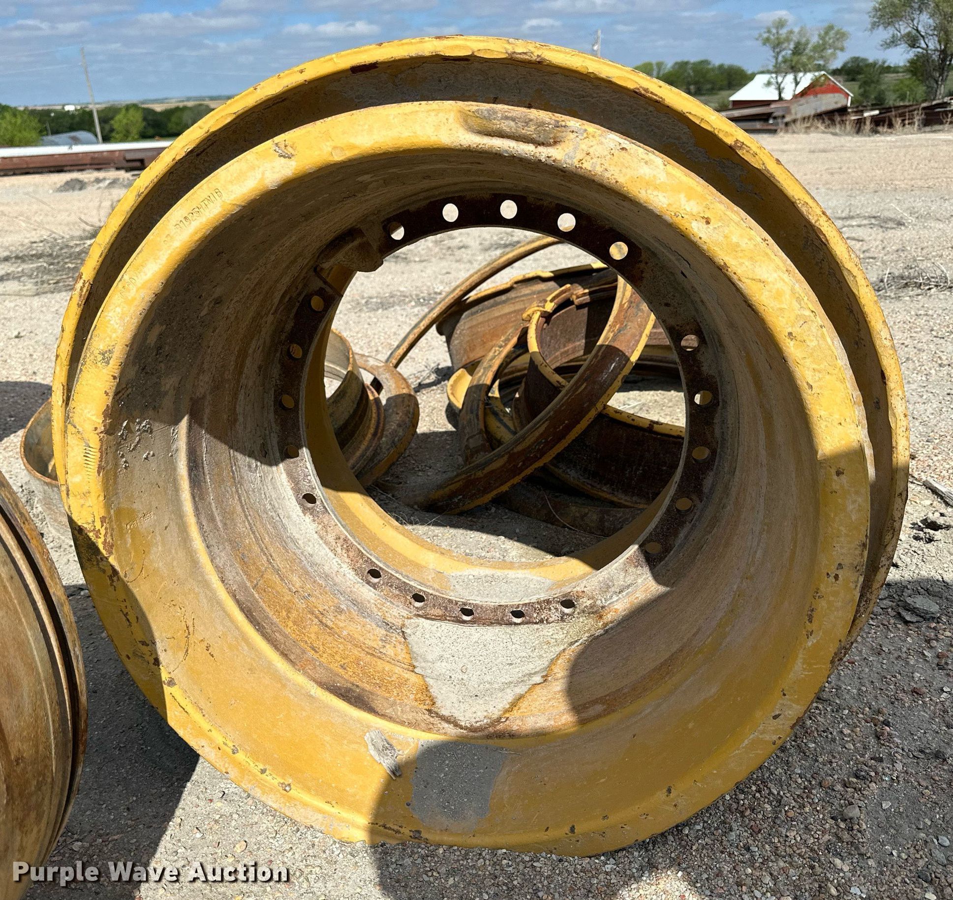 (4) Caterpillar wheels in Phillipsburg, KS | Item KL9102 sold | Purple Wave