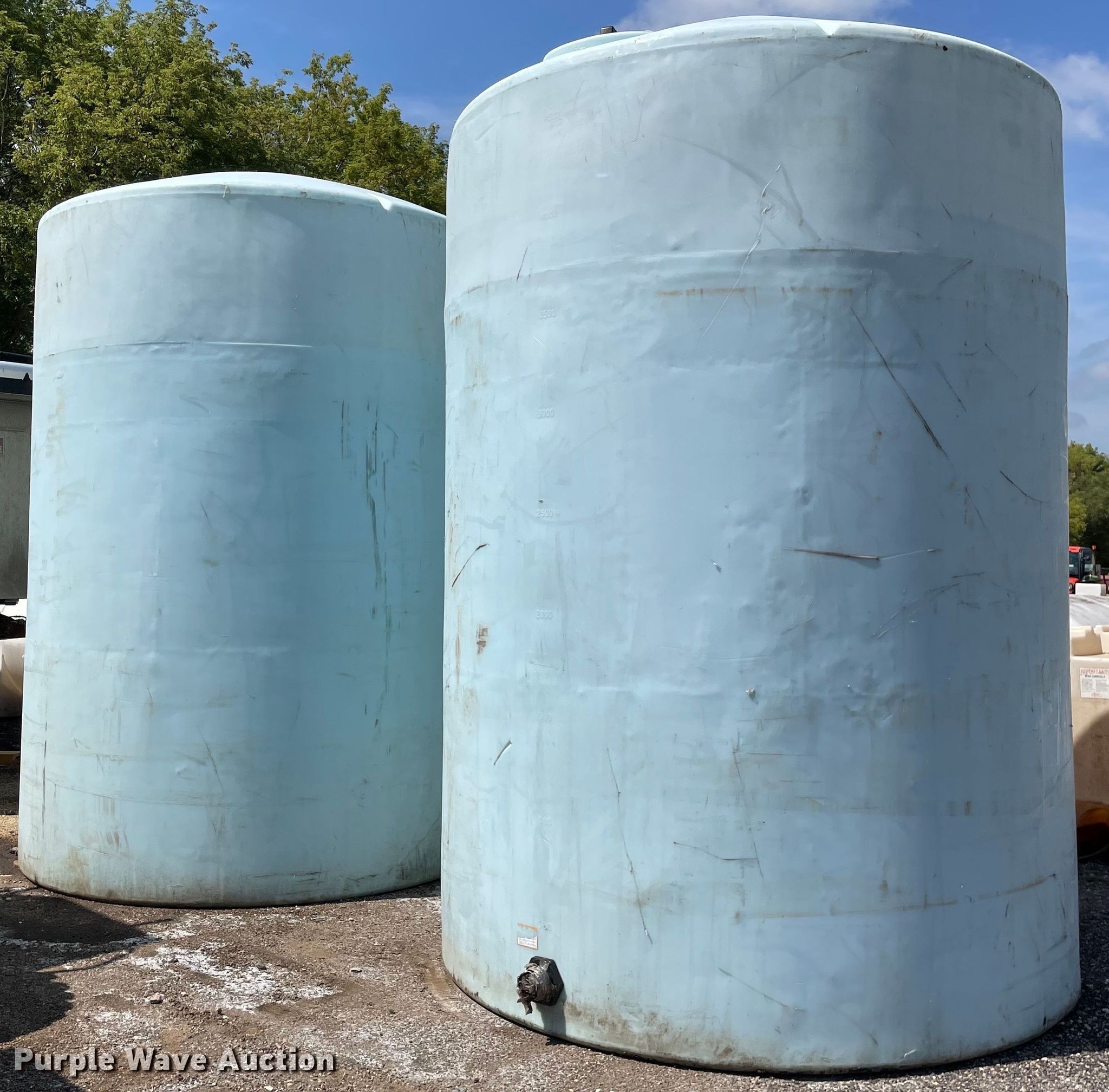 (2) 5,000 gallon poly tanks in Elgin, IL | Item DL3902 sold | Purple Wave