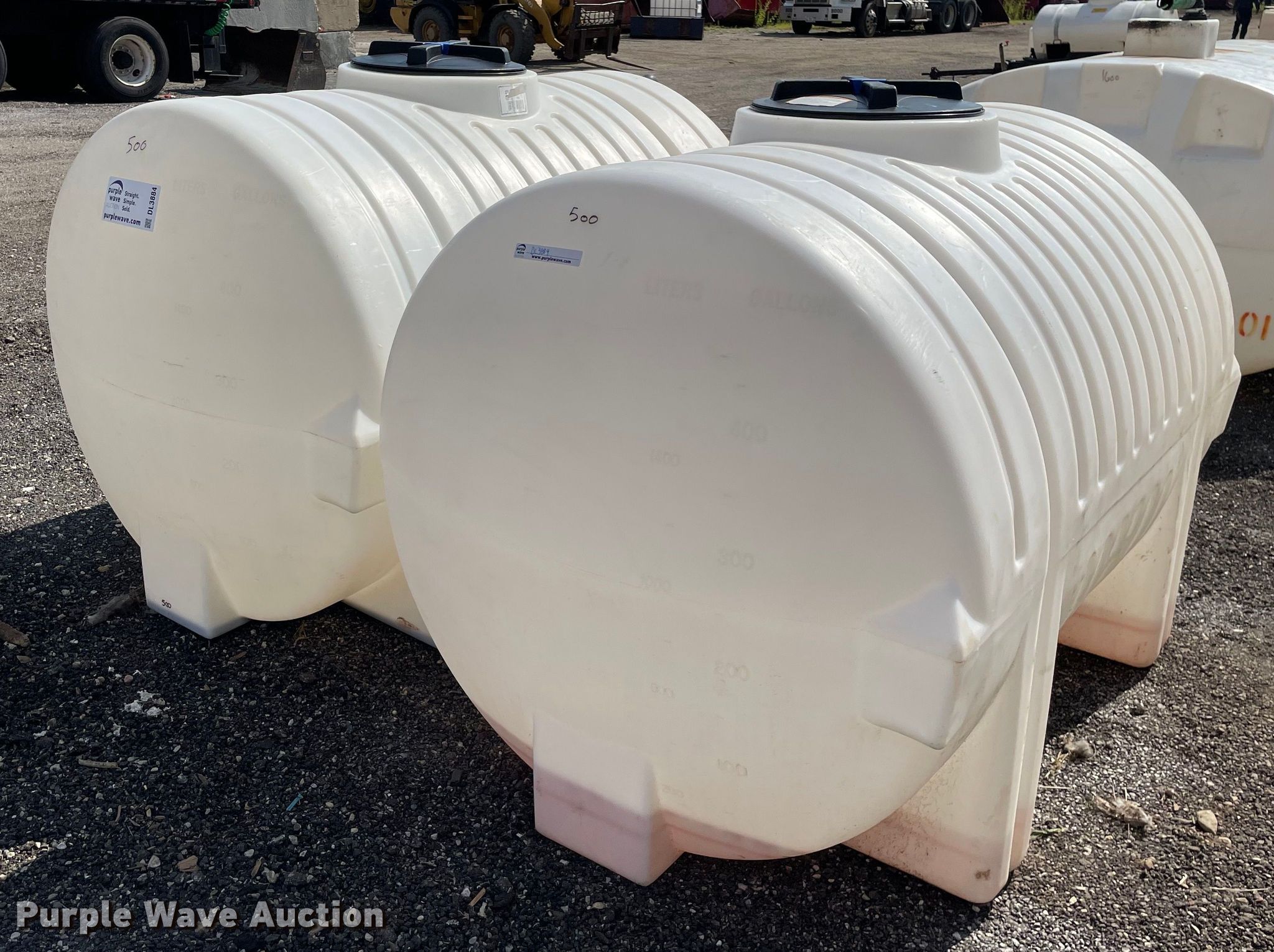 (2) 500 gallon poly tanks in Elgin, IL | Item DL3916 sold | Purple Wave