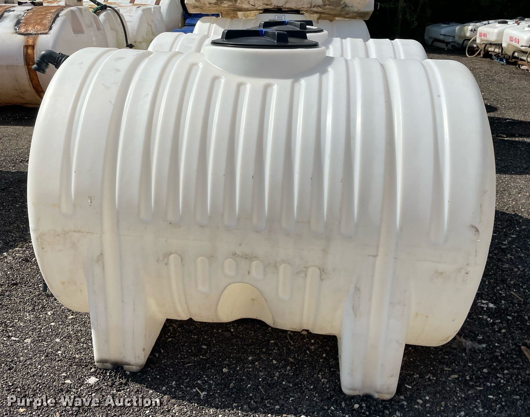 (2) 500 gallon poly tanks in Elgin, IL | Item DL3916 sold | Purple Wave