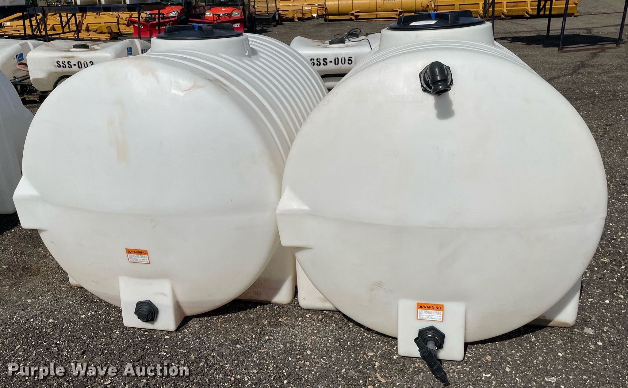 (2) 500 gallon poly tanks in Elgin, IL | Item DL3916 sold | Purple Wave
