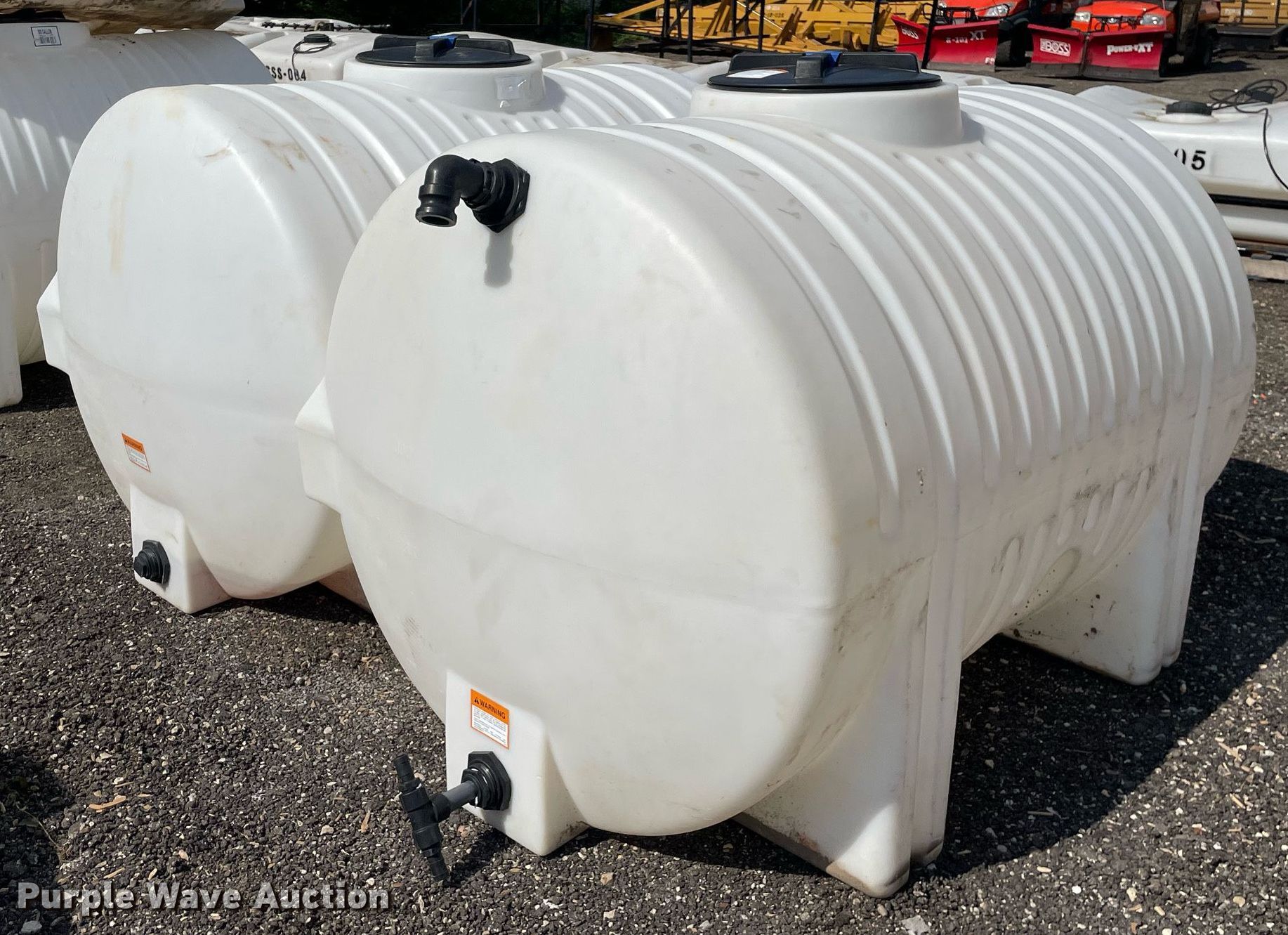 (2) 500 gallon poly tanks in Elgin, IL | Item DL3920 sold | Purple Wave