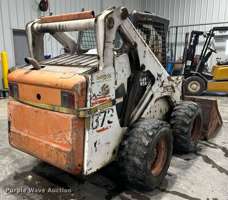 2000 Bobcat 873 skid steer loader in Ravenwood, MO | Item NL9355 for sale | Purple Wave