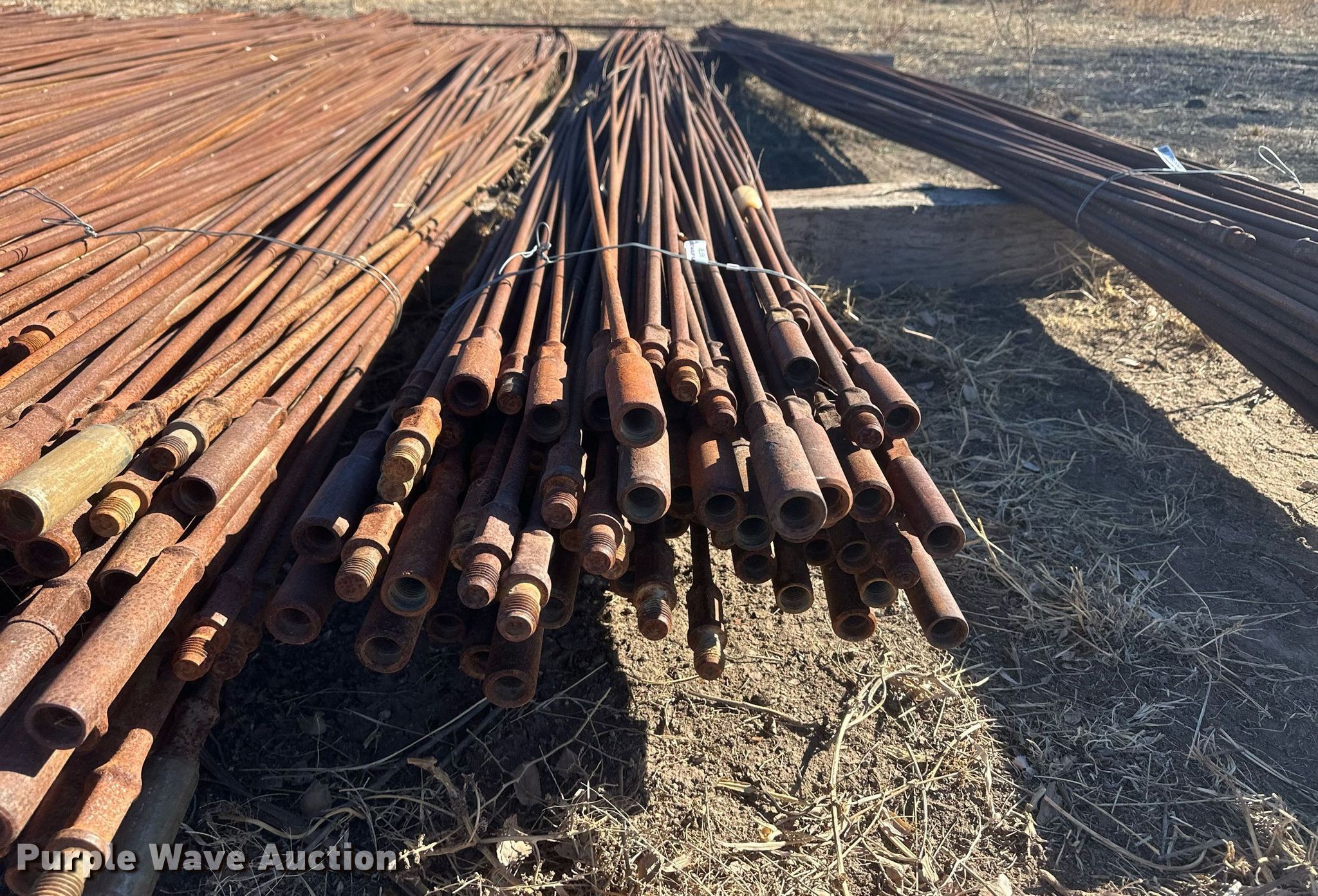 (100) sucker rods in Plains, KS | Item EK9790 for sale | Purple Wave