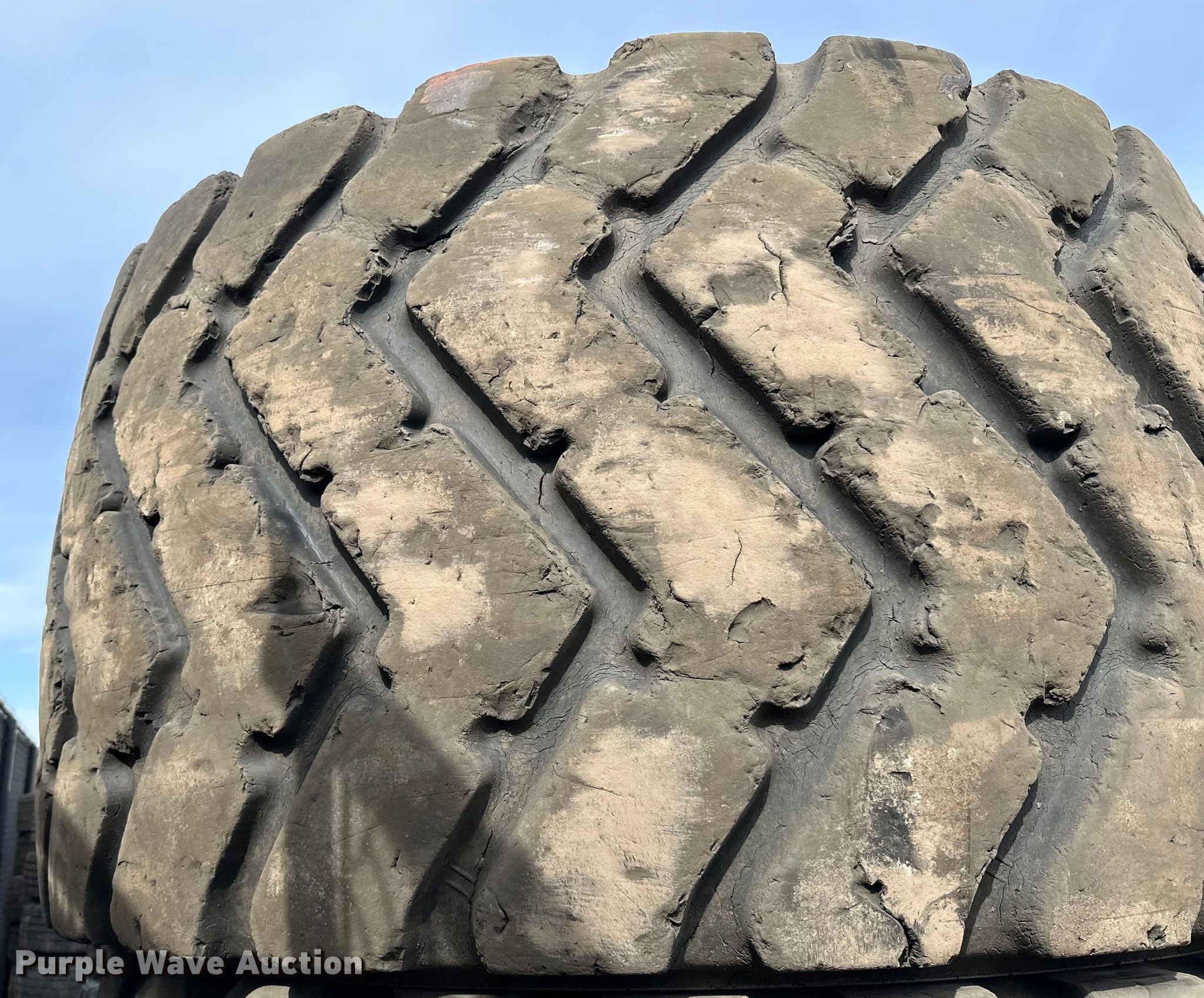 (3) 875/65R29 tires in St Paul, MN | Item DG0489 sold | Purple Wave