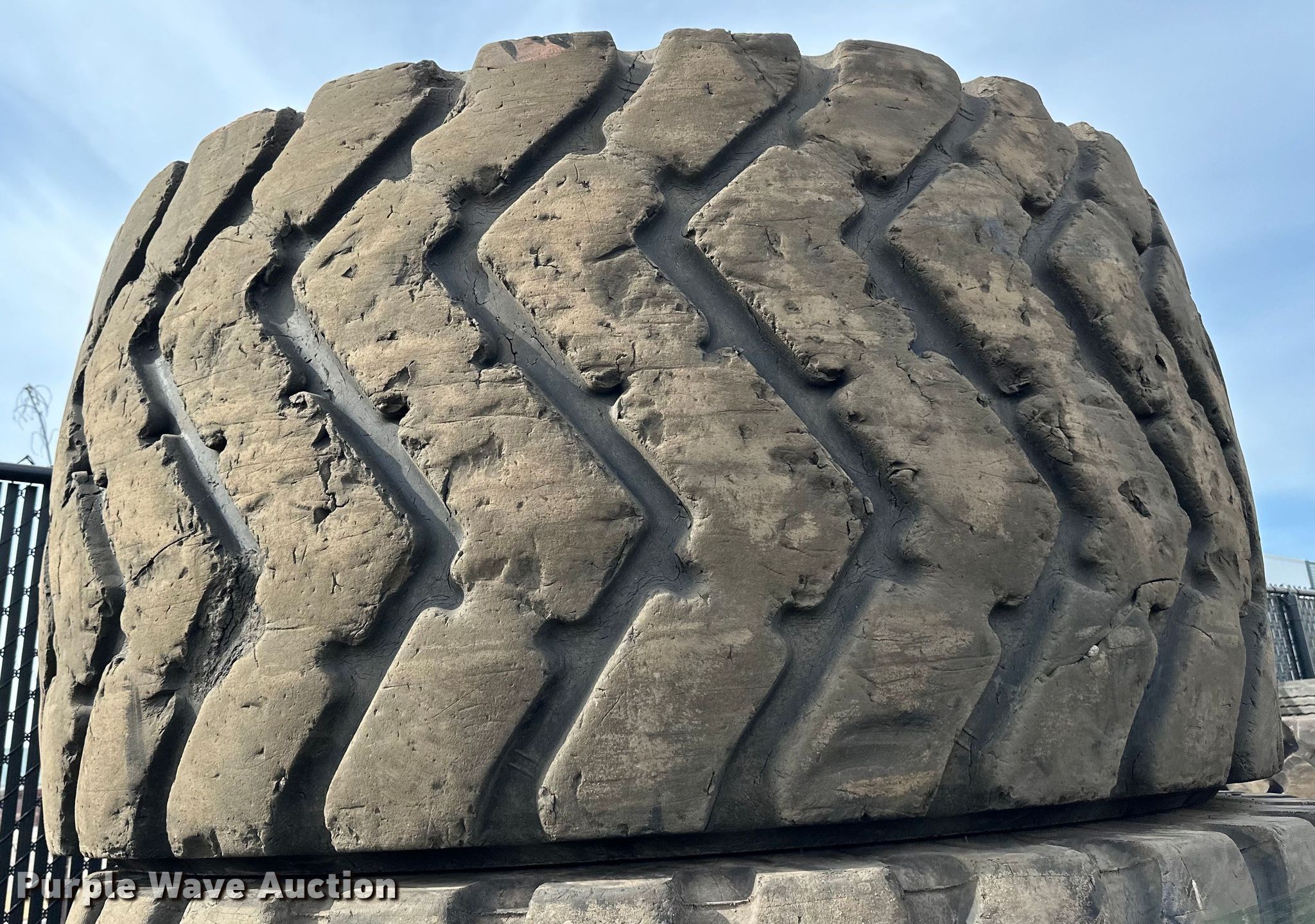 (3) 875/65R29 tires in St Paul, MN | Item DG0489 sold | Purple Wave