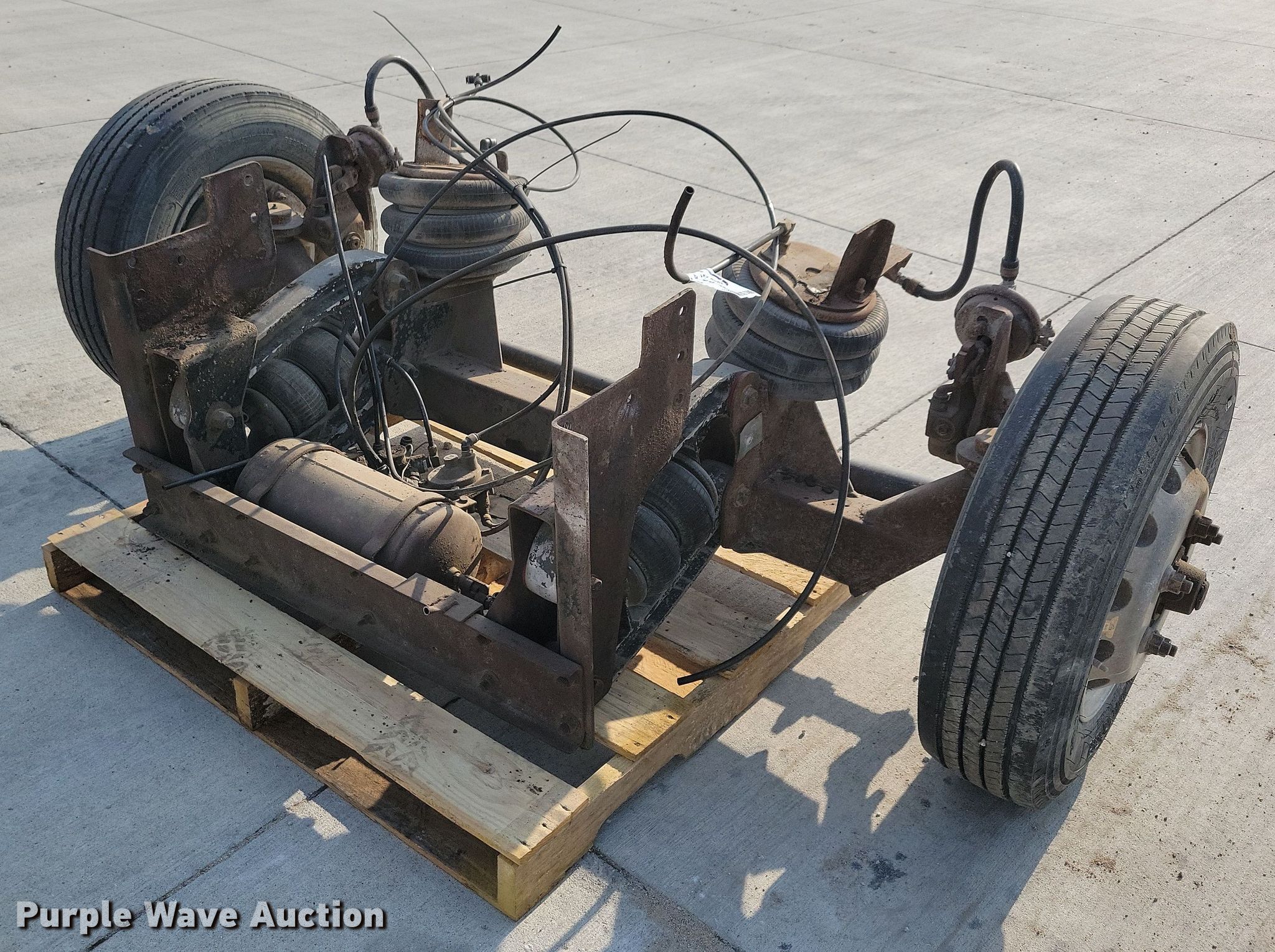 Hendrickson lift axle in Granger, IA | Item DG0599 sold | Purple Wave