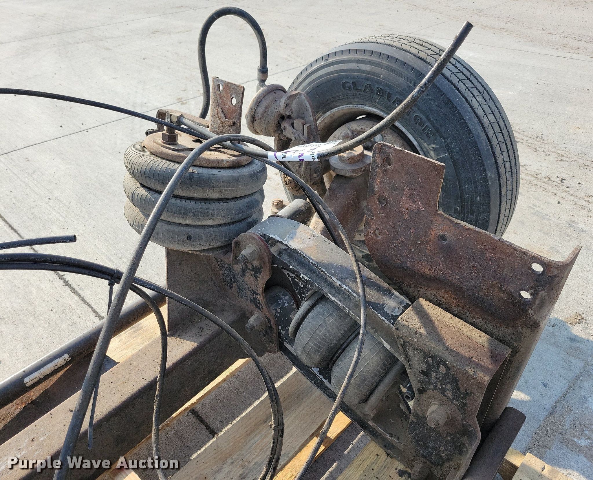 Hendrickson lift axle in Granger, IA | Item DG0599 sold | Purple Wave