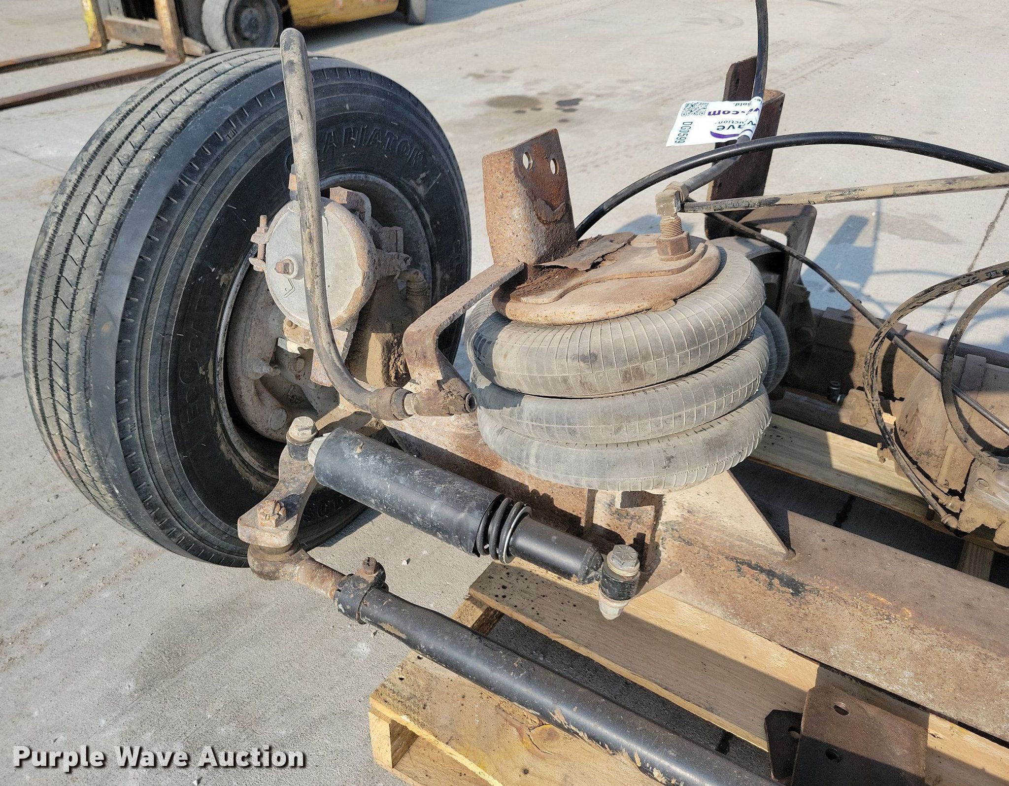 Hendrickson lift axle in Granger, IA | Item DG0599 sold | Purple Wave