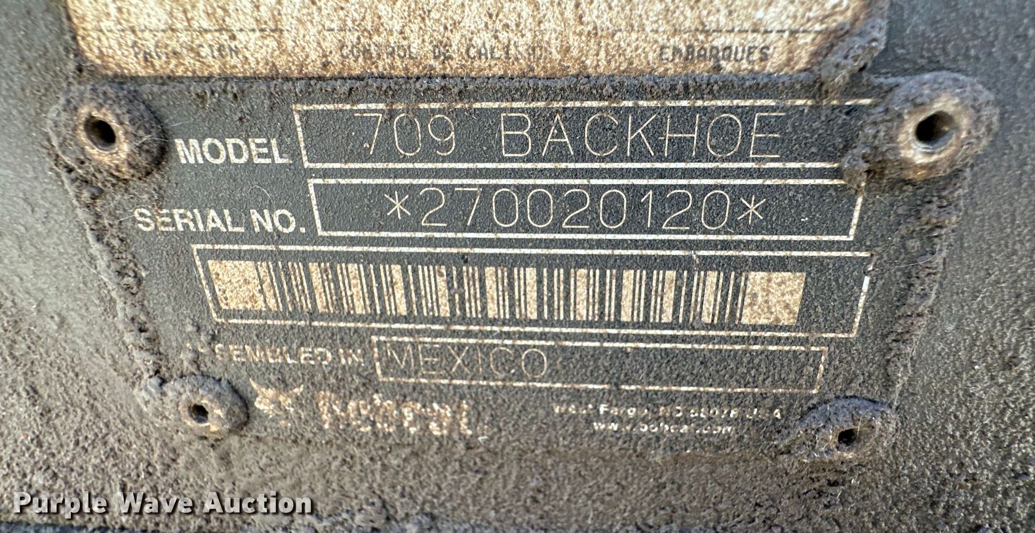 Bobcat 709 skid steer backhoe in Dodge City, KS | Item OL9643 sold ...