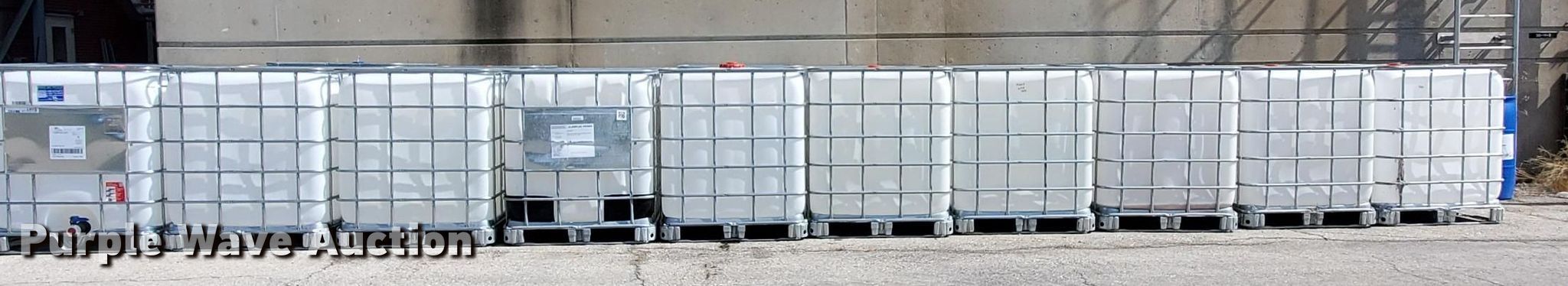 (20) 250 gallon poly totes in Lawrence, KS | Item EK6290 sold | Purple Wave