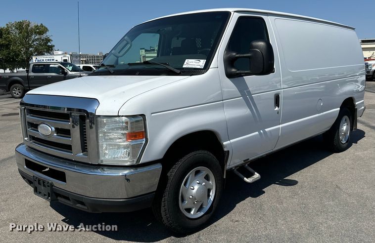 2014 Ford Econoline E150 van in Wichita, KS | Item DH1266 sold | Purple ...