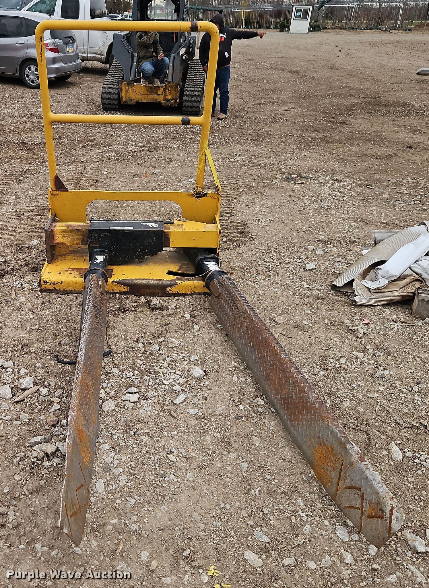 Logan skid steer forks in Olathe, KS | Item EI8899 for sale | Purple Wave