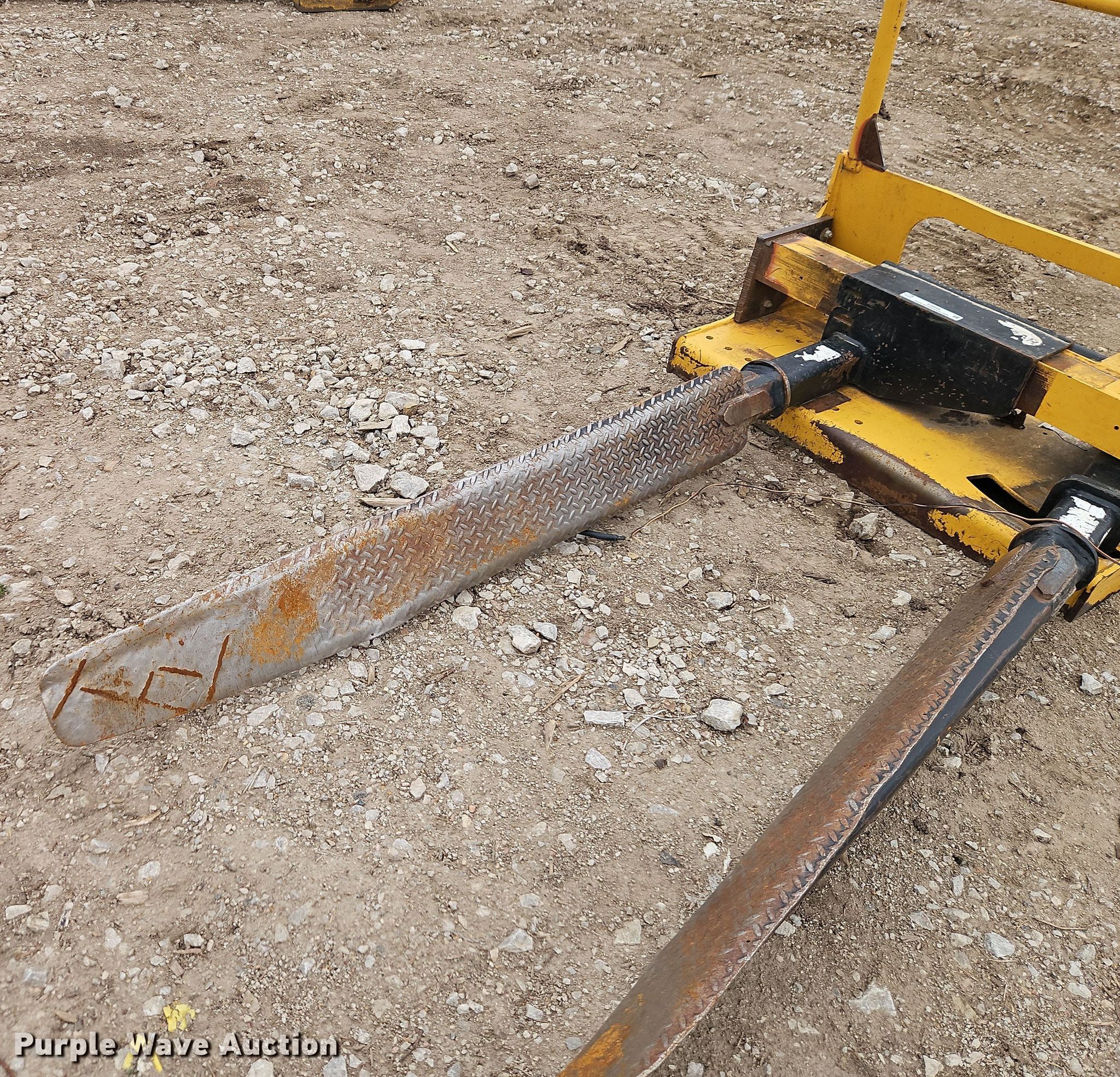 Logan skid steer forks in Olathe, KS | Item EI8899 for sale | Purple Wave