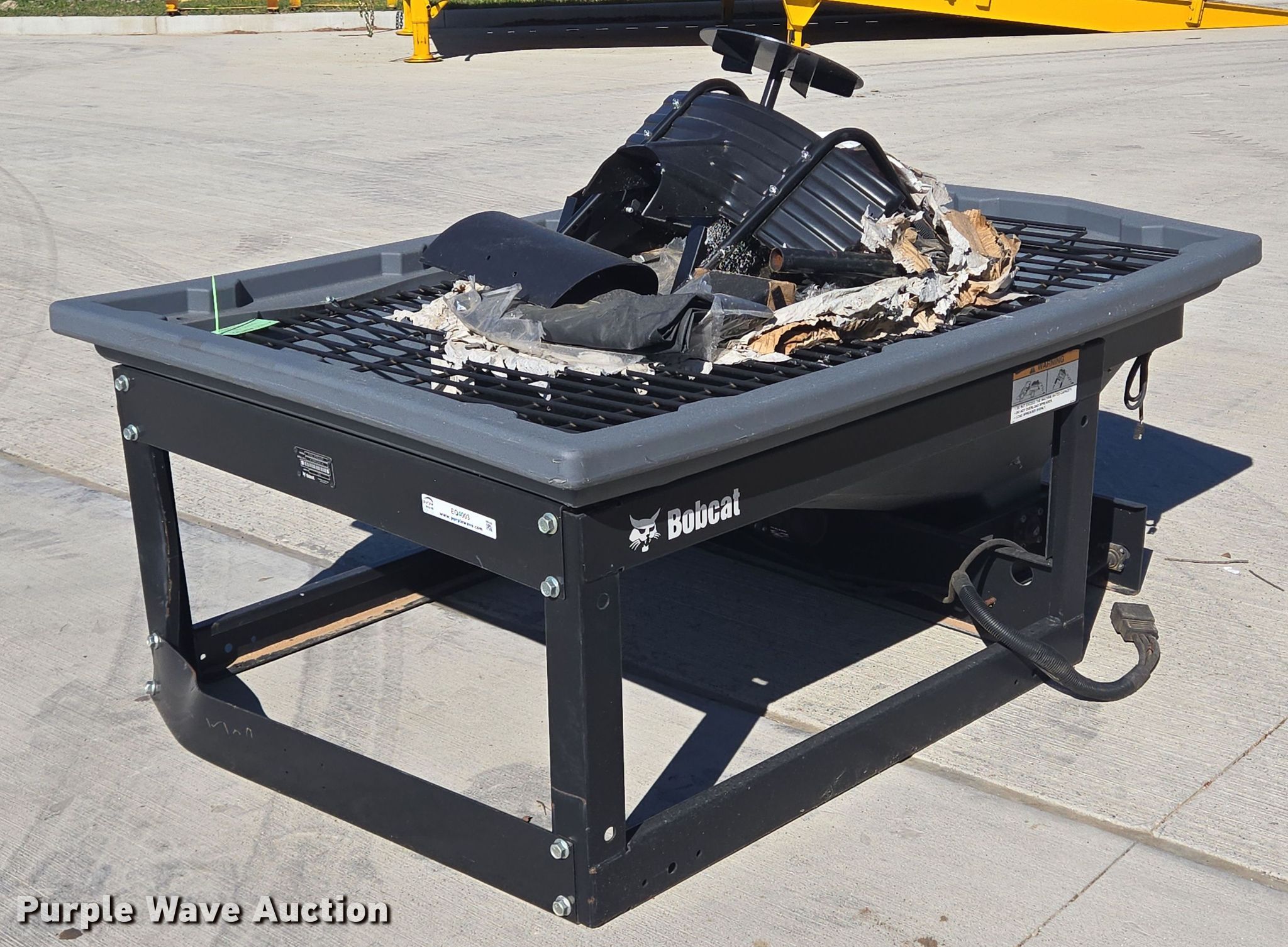 Bobcat sand spreader in Porter, TX | Item EQ4003 sold | Purple Wave