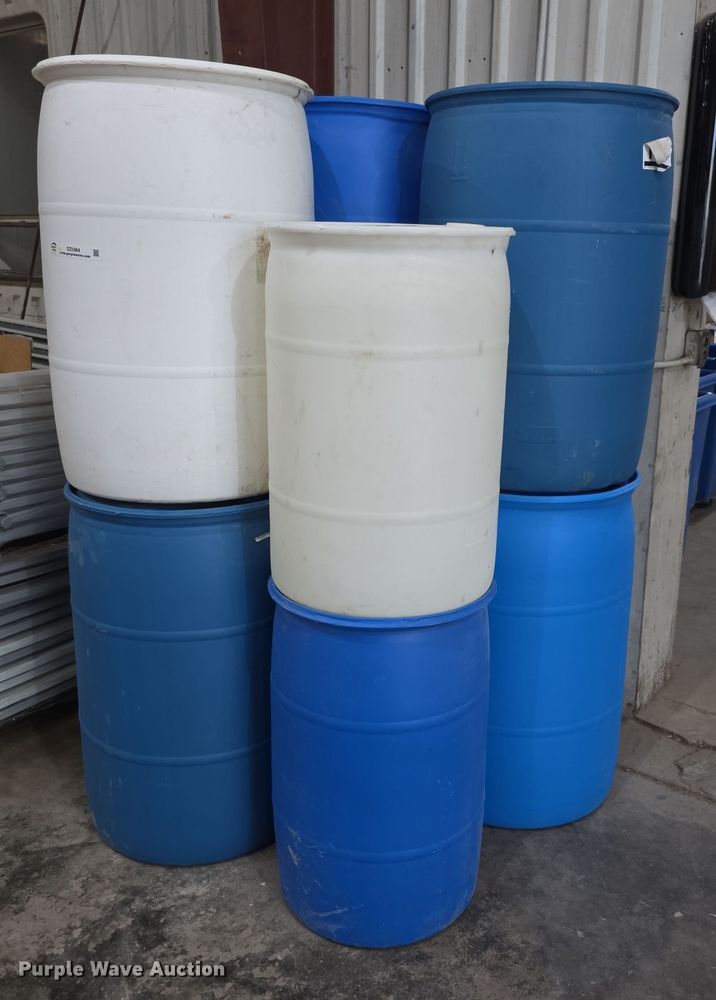 (8) plastic barrels in Manhattan, KS | Item DZ5984 sold | Purple Wave